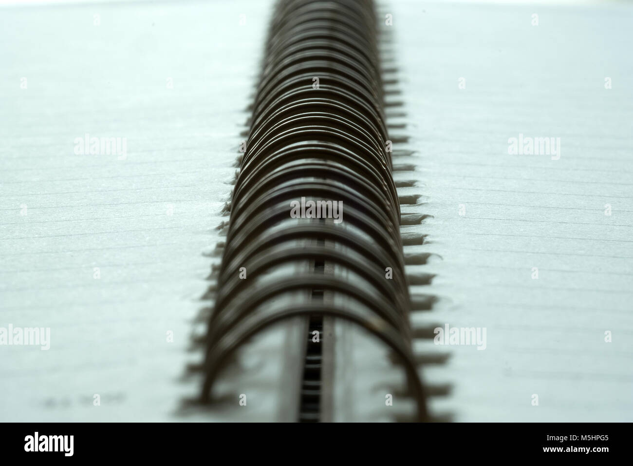 Extreme closeup of a spiral notebook closeup notepad as mockup for your ...