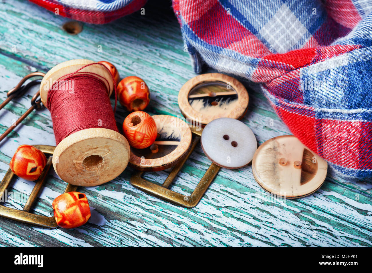 sewing kit from sewing thread, buttons and fabric Stock Photo - Alamy