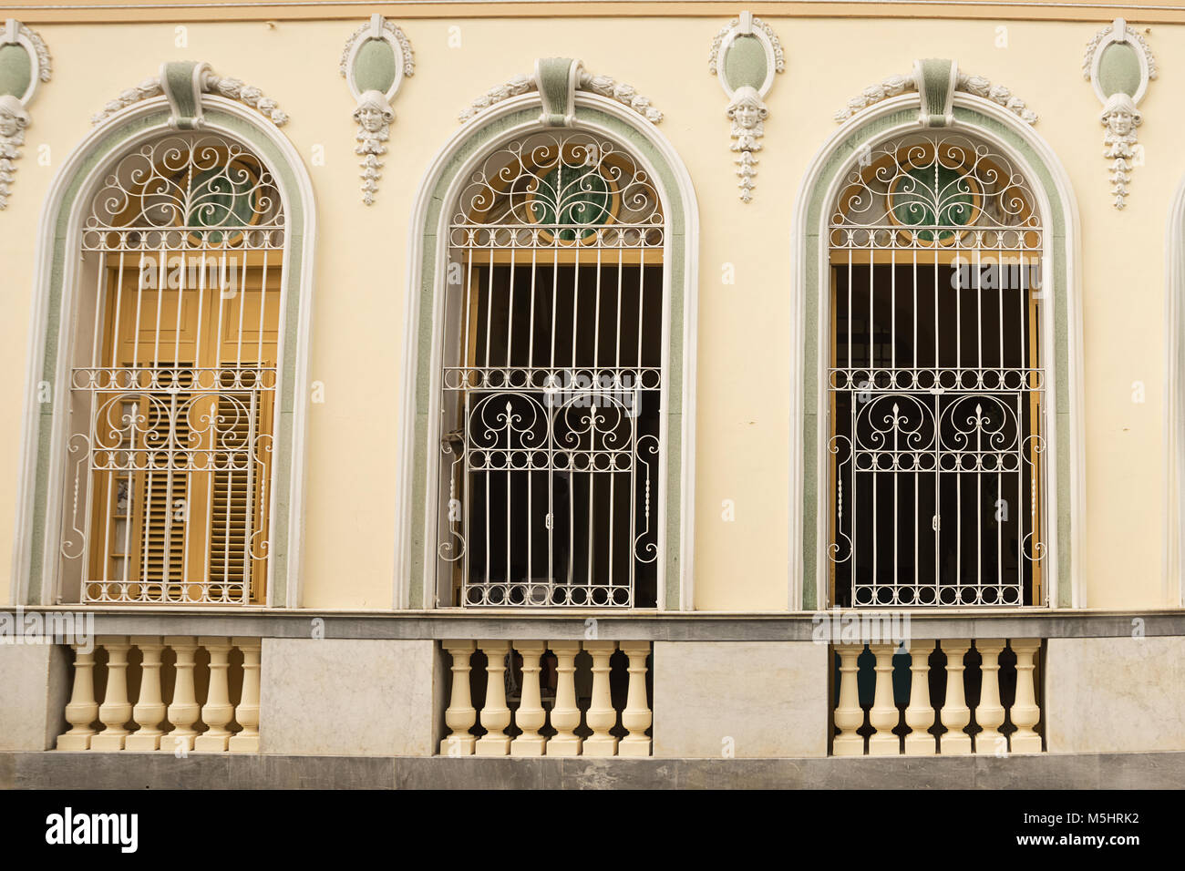 Typical Cuban palace window with iron protection grate Stock Photo - Alamy