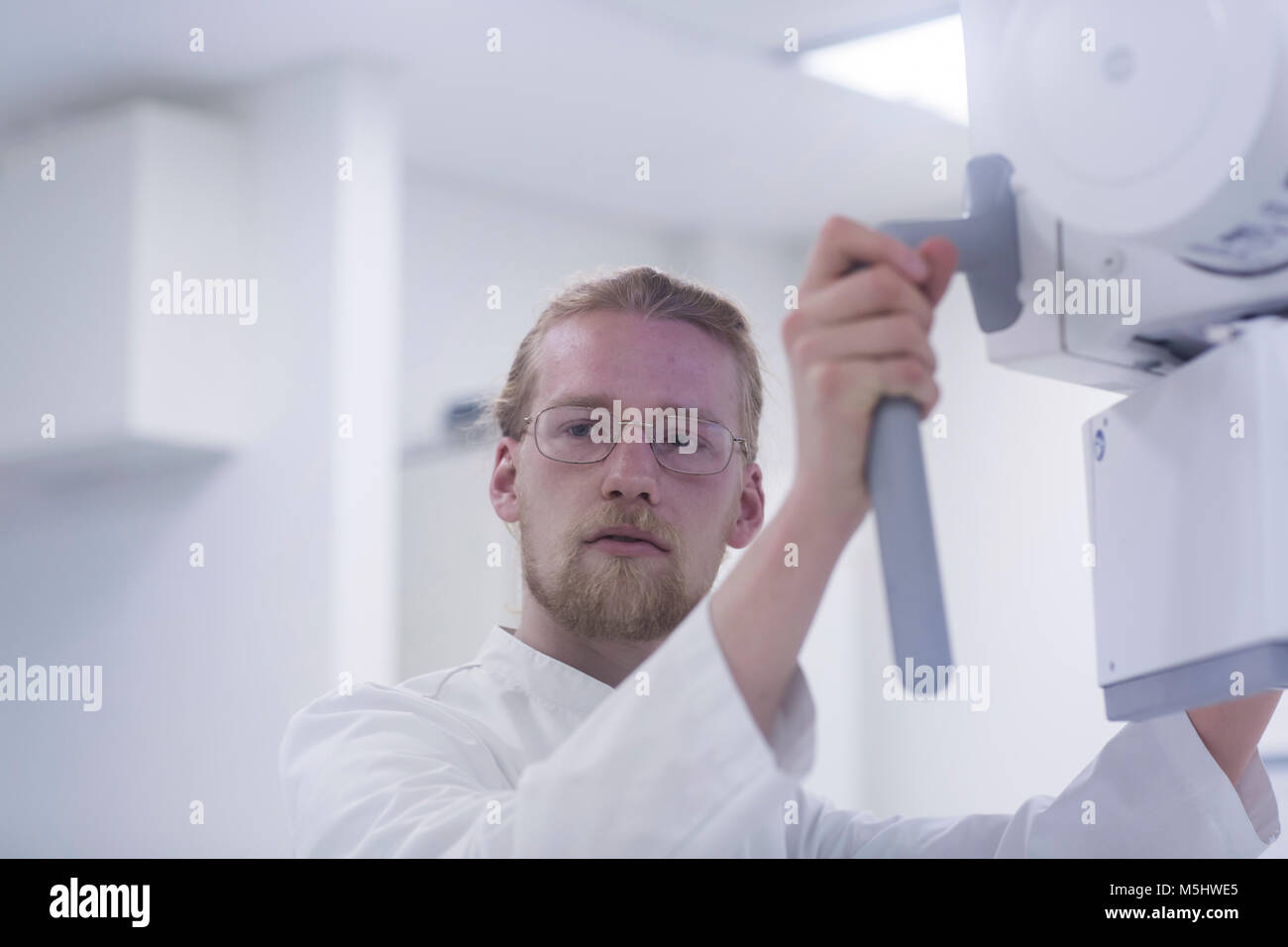 Radiologist operating X-ray machine Stock Photo - Alamy