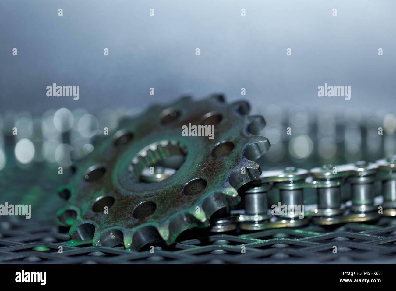 Gear wheel and chain closeup Stock Photo - Alamy