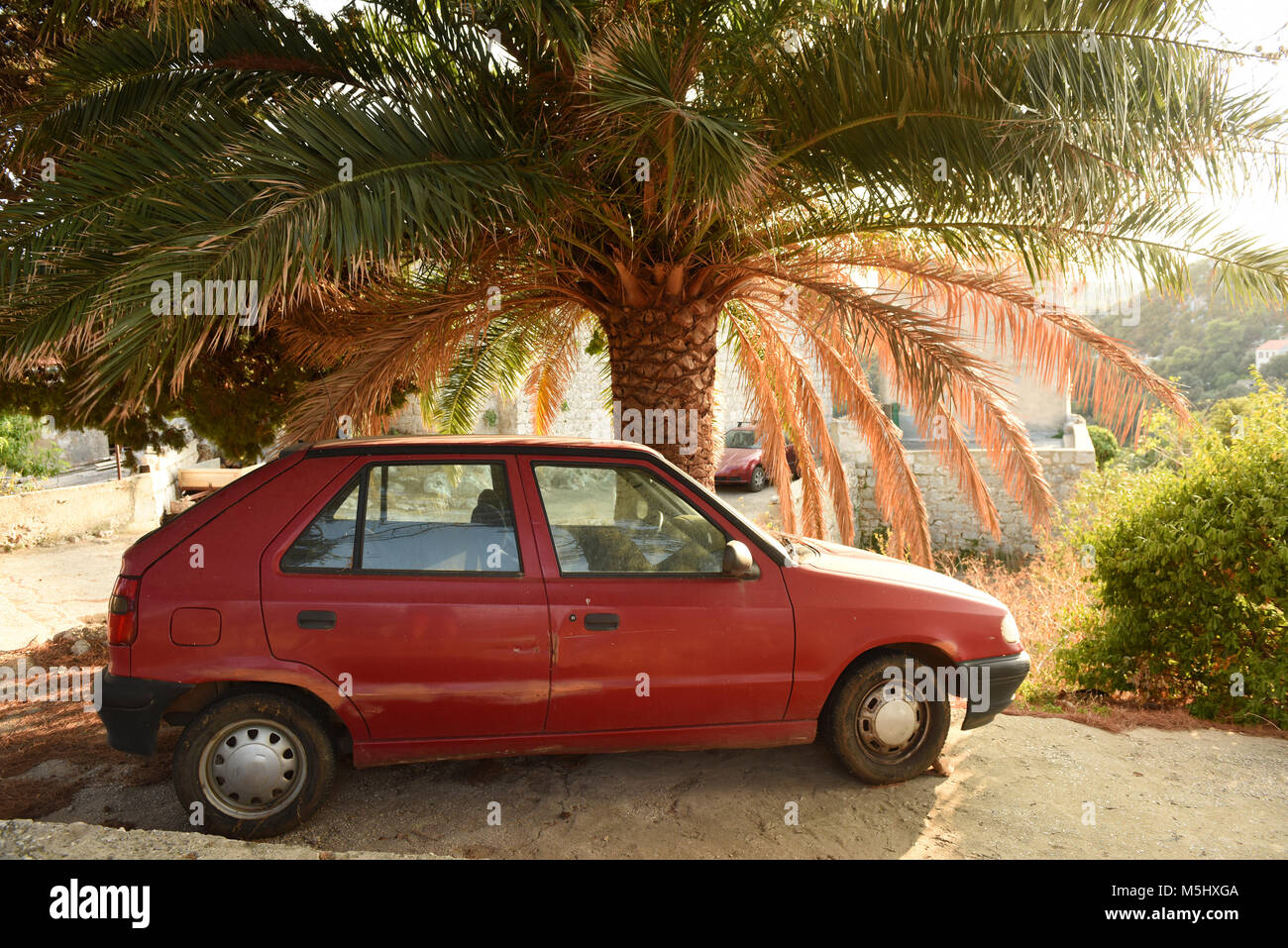 Old car on mediterranean island Stock Photo - Alamy