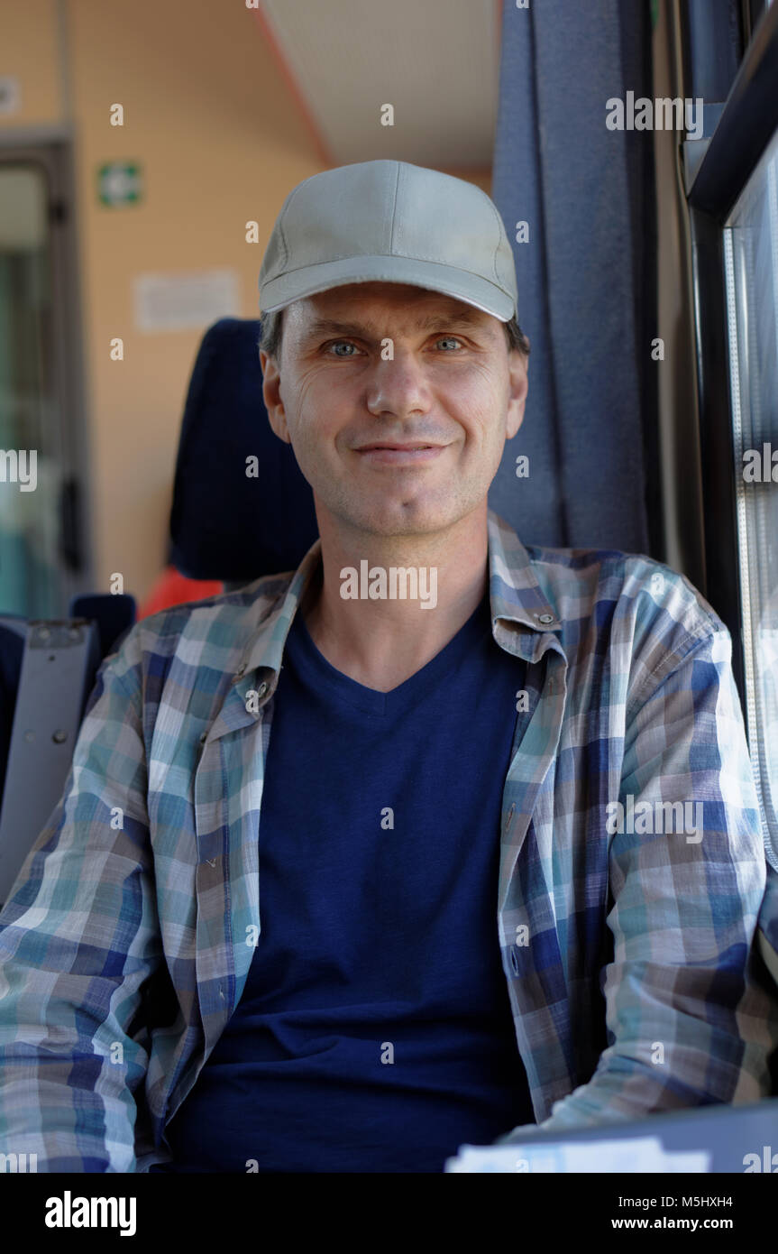 Happy commuter train seat hi-res stock photography and images - Alamy