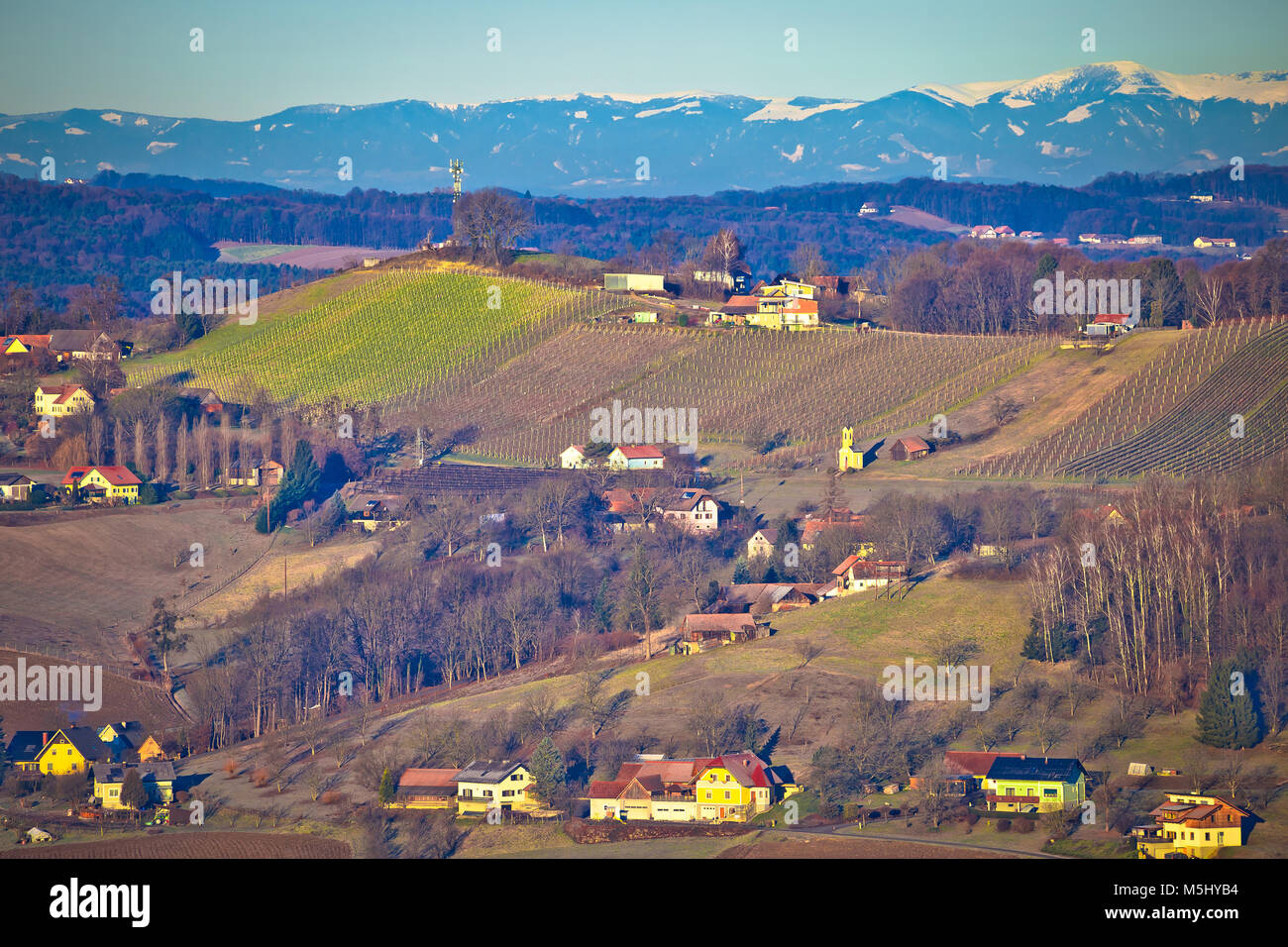 Countryside landscape of Styria region with mountain under snow in ...
