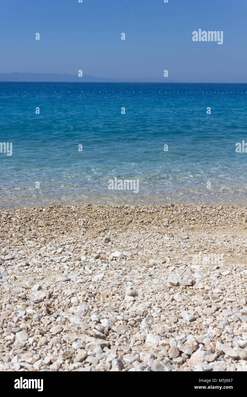 TUCEPI, CROATIA - AUGUST 13 2017: Stobrec beach with its white pebbles ...