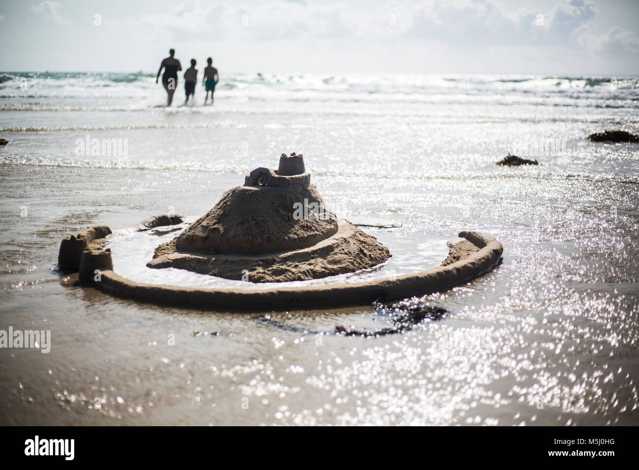Family beach castle hi-res stock photography and images - Alamy