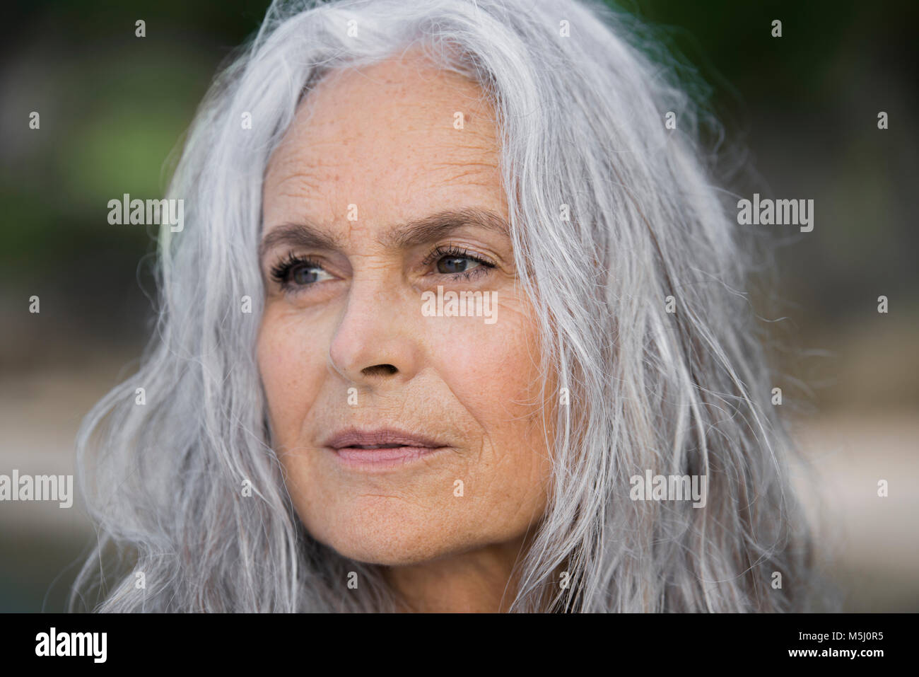 Portrait of a beautiful senior woman Stock Photo - Alamy
