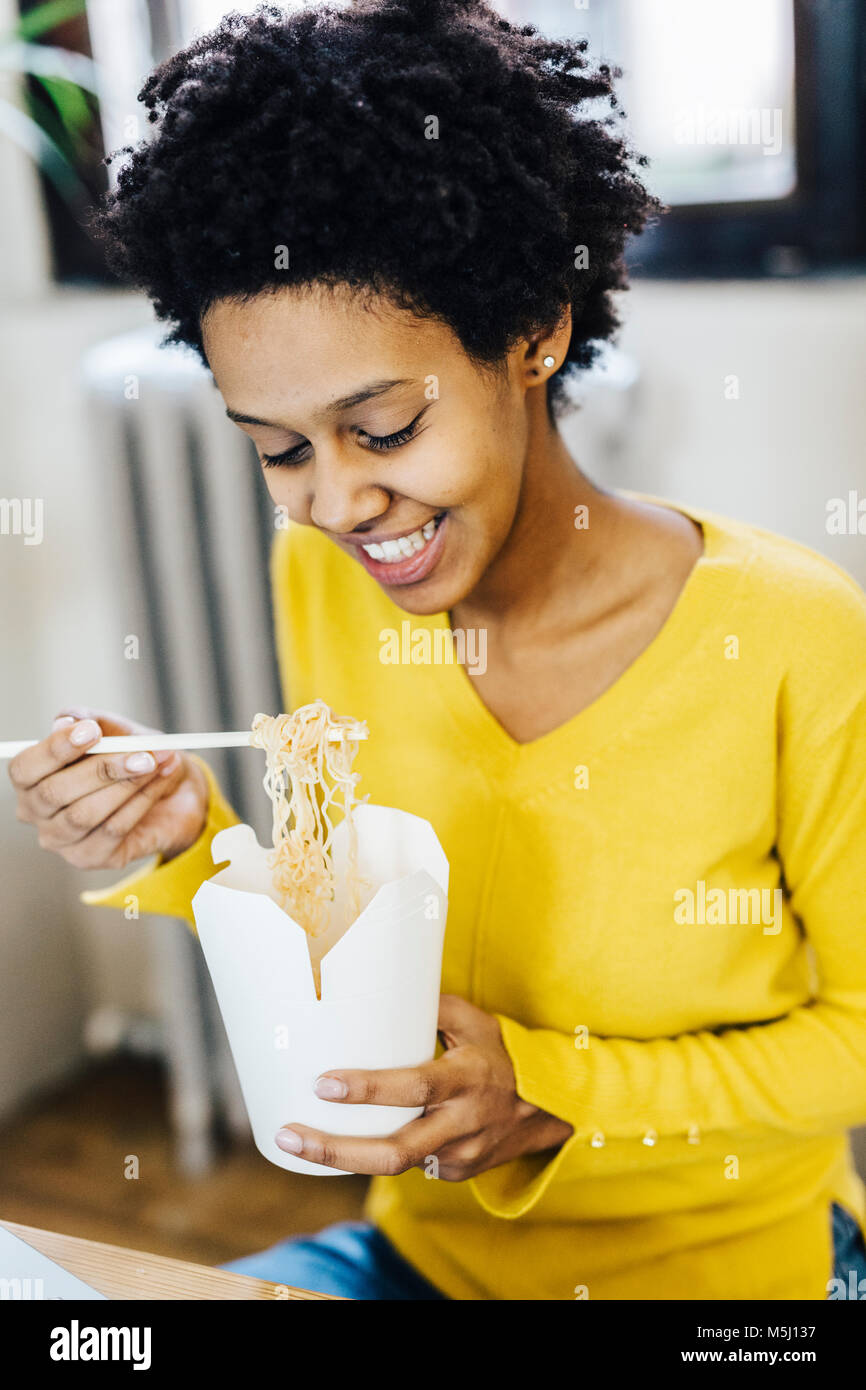 African eating noodles hi-res stock photography and images - Alamy