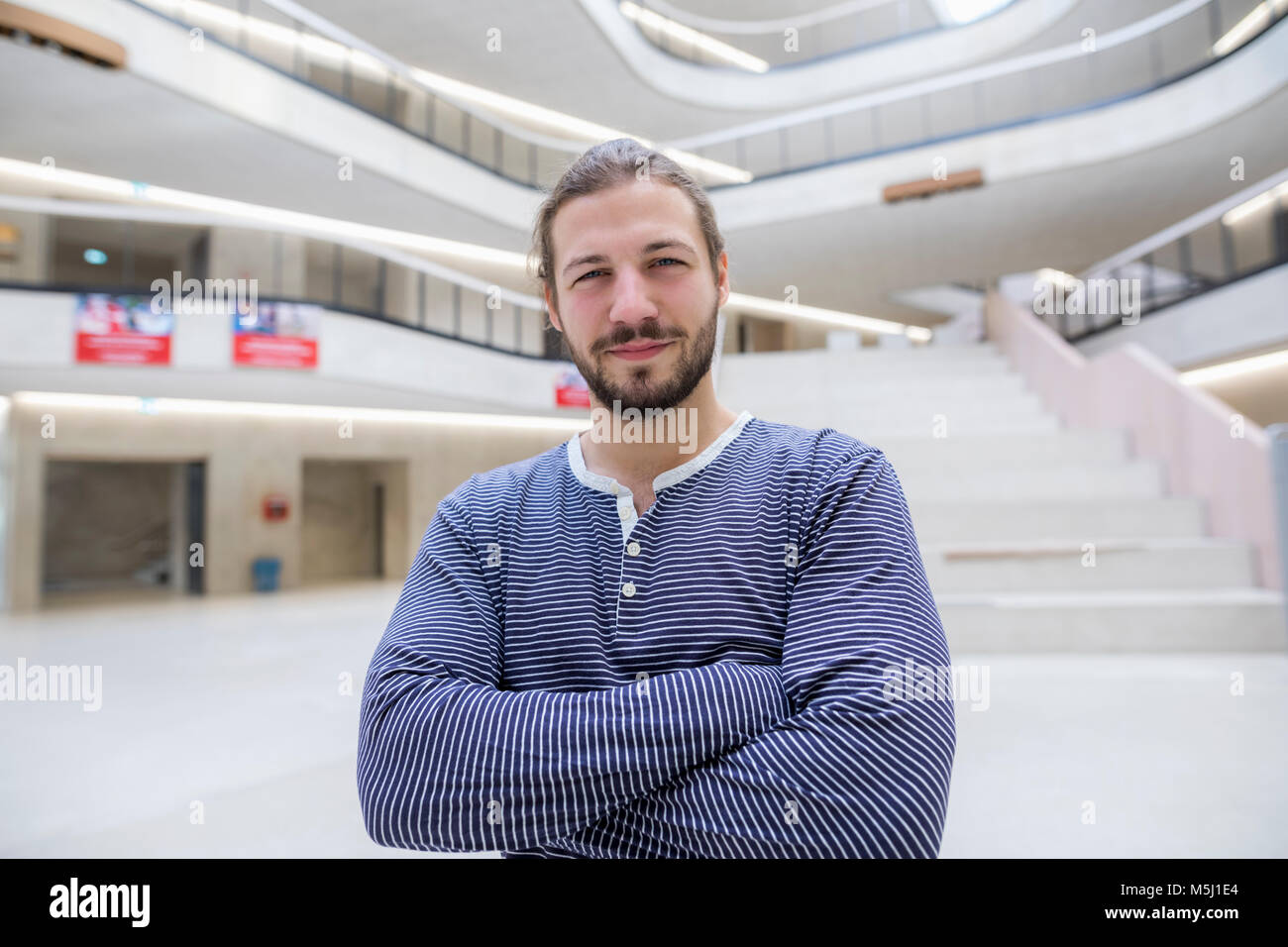 Portrait of student in university Stock Photo - Alamy