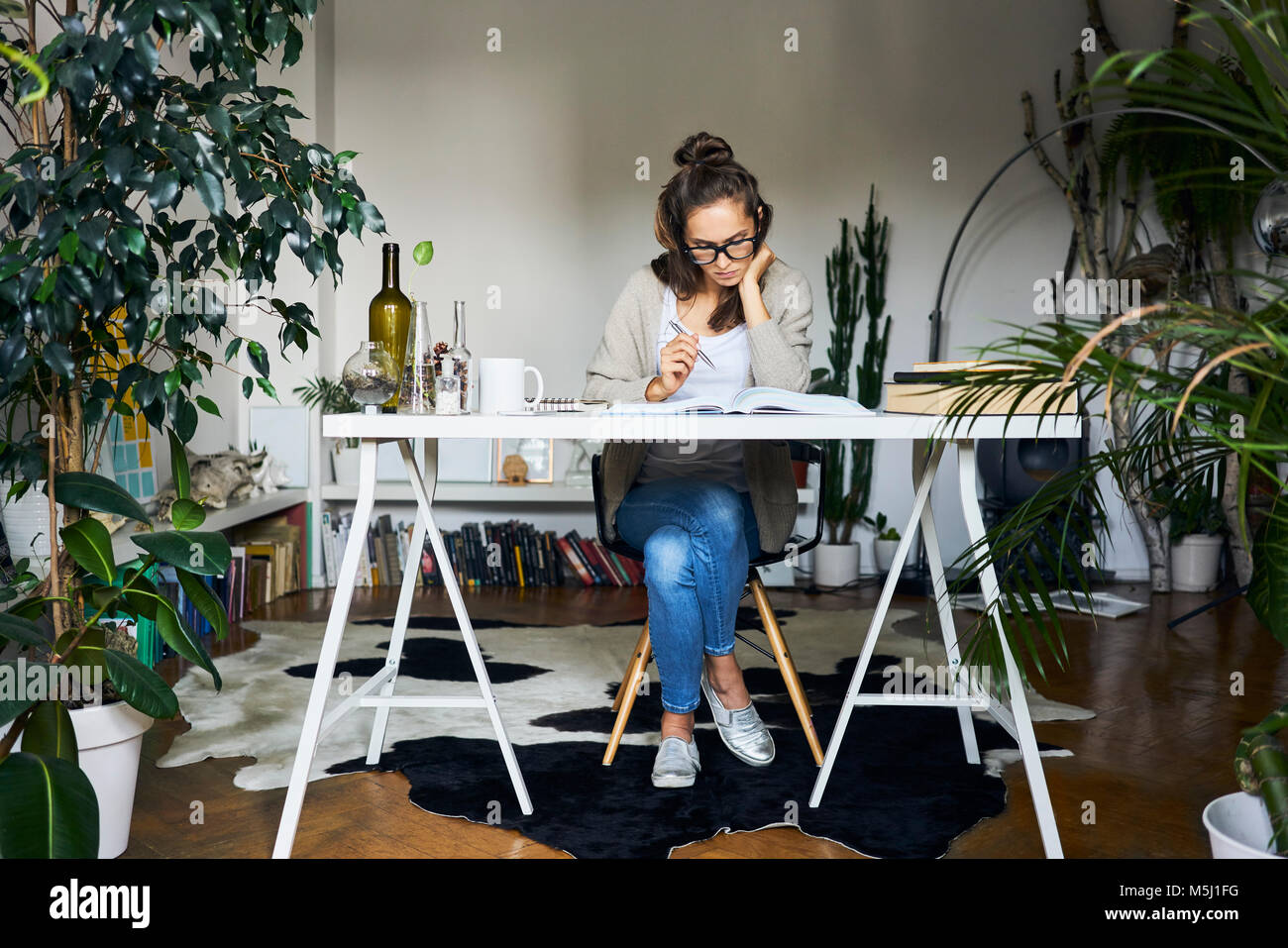 Female student learning at home Stock Photo - Alamy