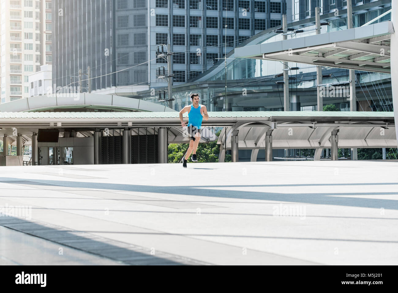 Man running in bangkok city hi-res stock photography and images - Alamy