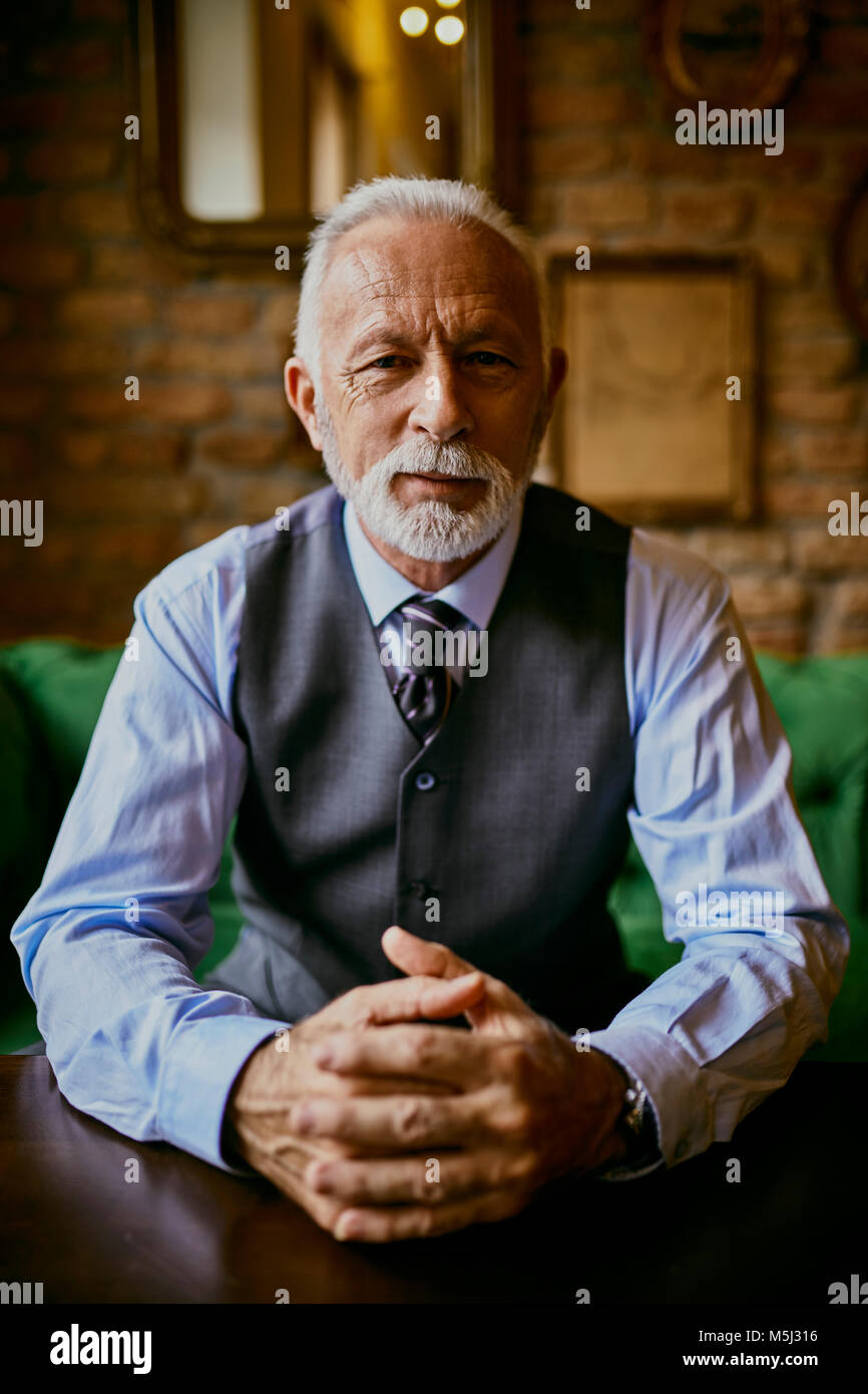 Old man sitting in cafe hi-res stock photography and images - Alamy