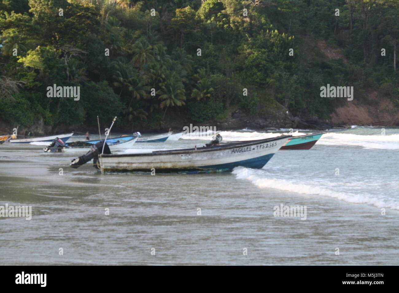 Boats On Maracas Beach Stock Photo - Alamy