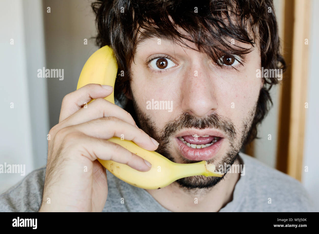 Funny Man With Banana High Resolution Stock Photography and Images - Alamy