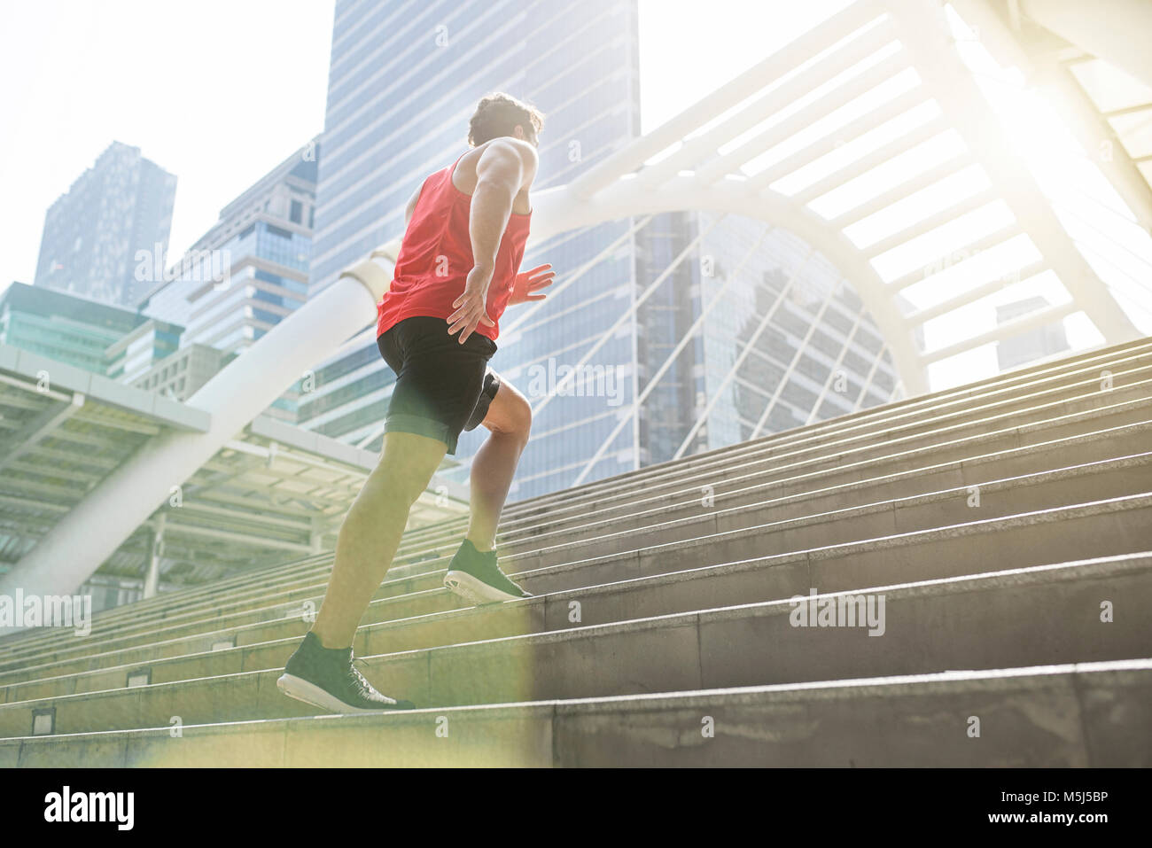 Man in red shirt hi-res stock photography and images - Alamy