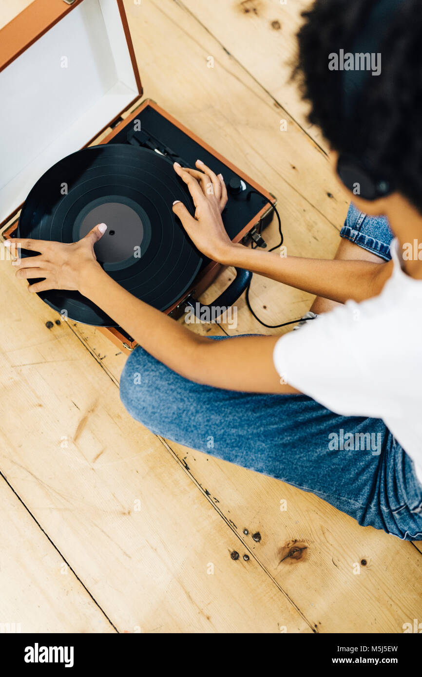 Listening music from analogue record player hi-res stock photography ...