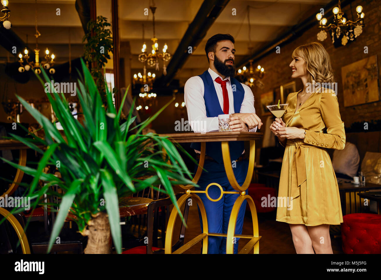 Couple flirting bar hi-res stock photography and images - Alamy