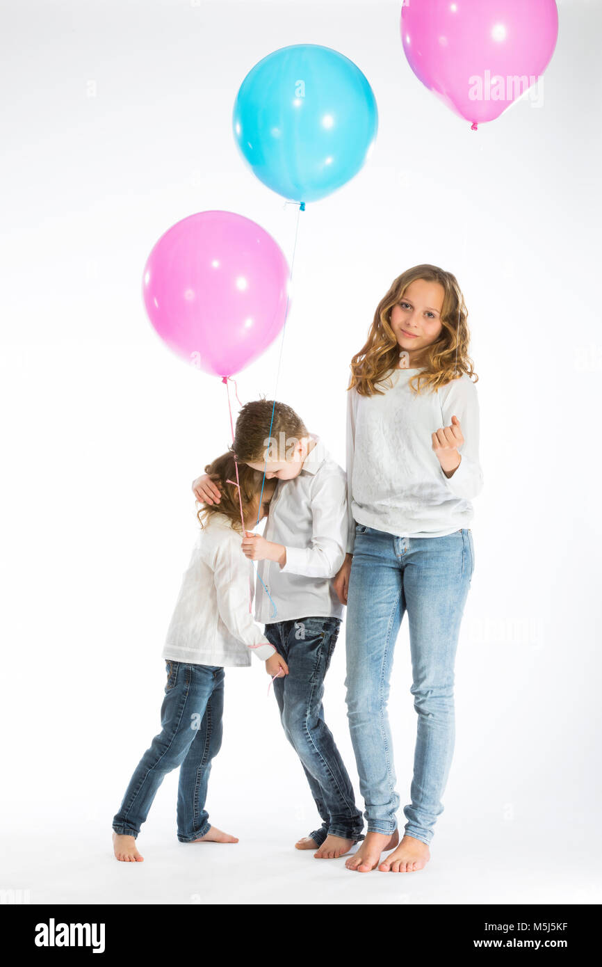 Children playing with balloons Stock Photo - Alamy