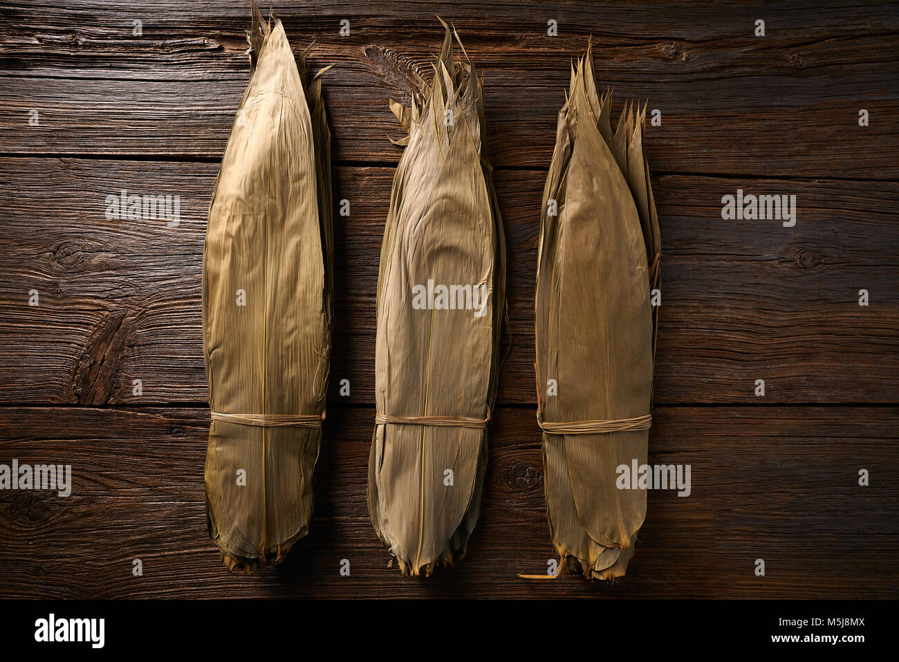 Dried Bamboo leaves in brown for Zongzi asian recipe preparation Stock ...