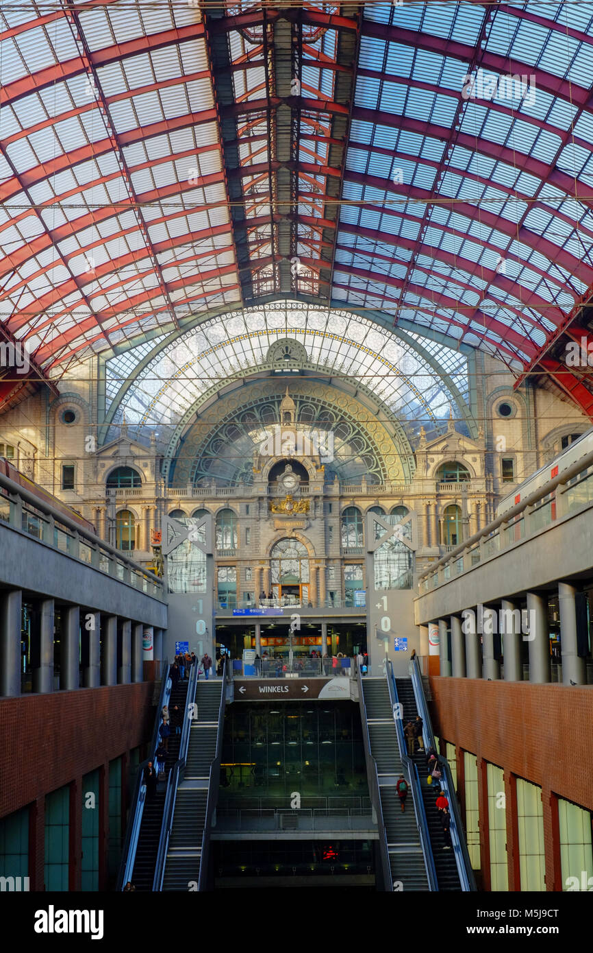 Tourists and commuters in the beautiful historic Antwerp Central train ...