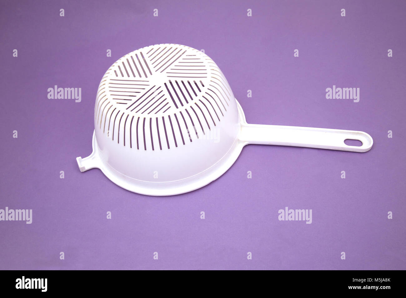 Plastic strainer hi-res stock photography and images - Alamy