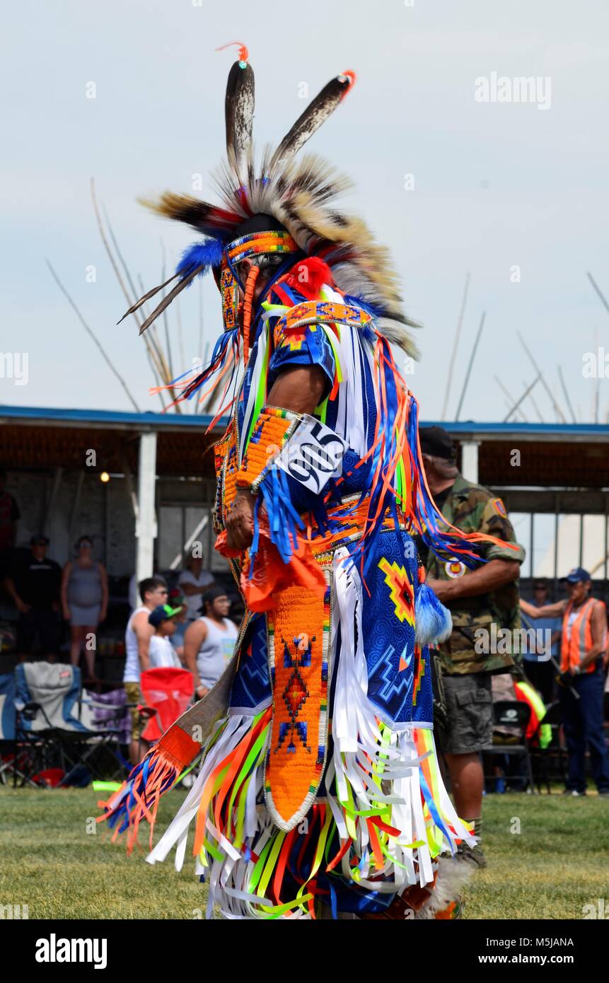 Male aboriginal dancers with stunning colorful costumes and headpieces ...
