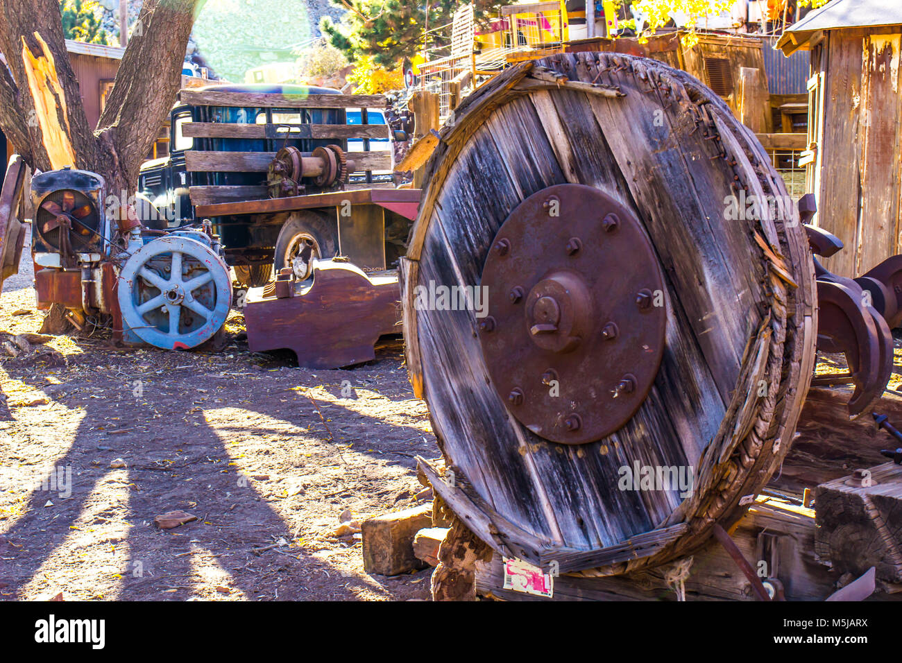 Vintage Wooden Wheels Once Used In Mining Operations Laying In Salvage ...