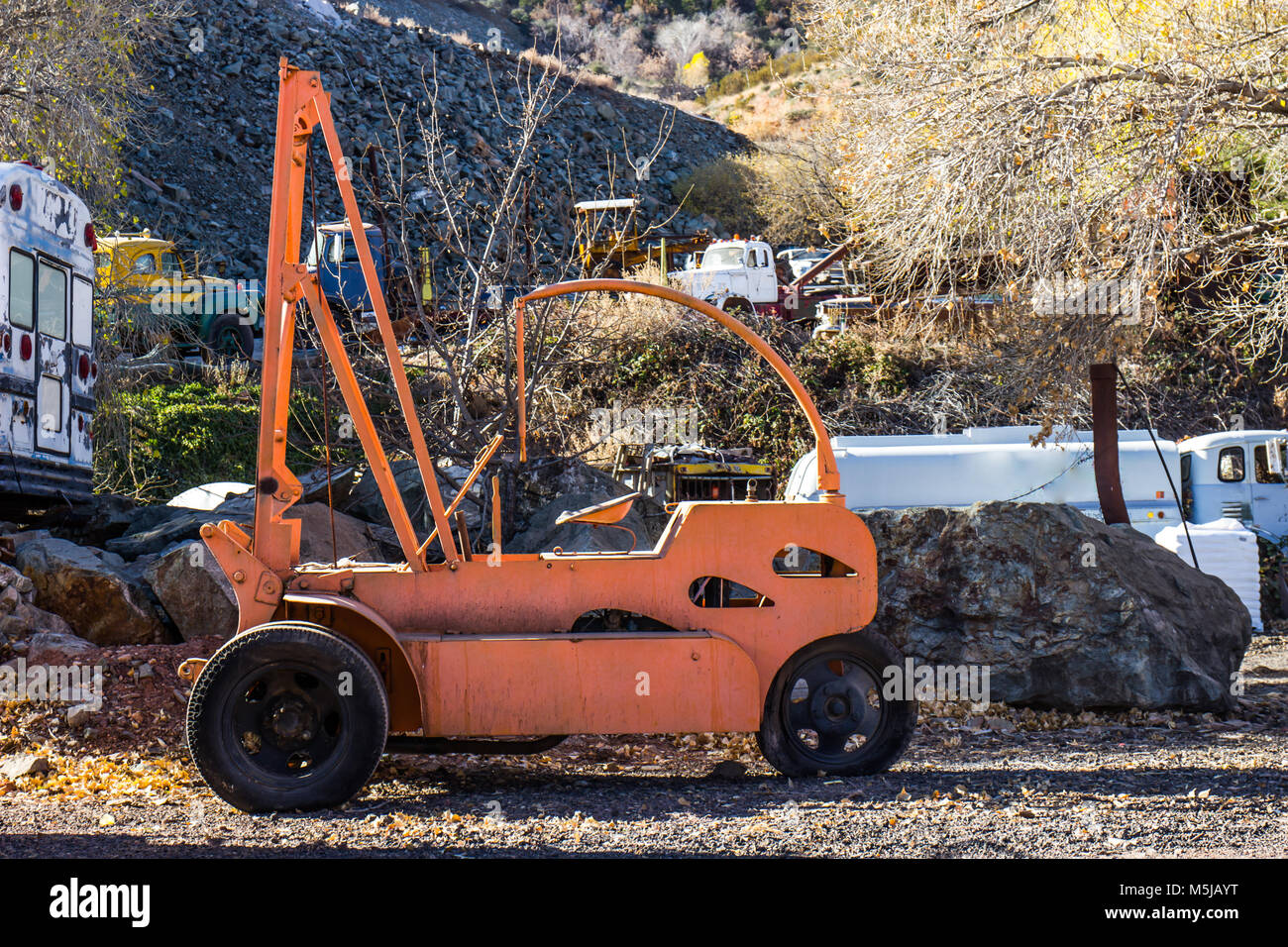 Vintage Orange Three Wheel Forklift Stock Photo - Alamy