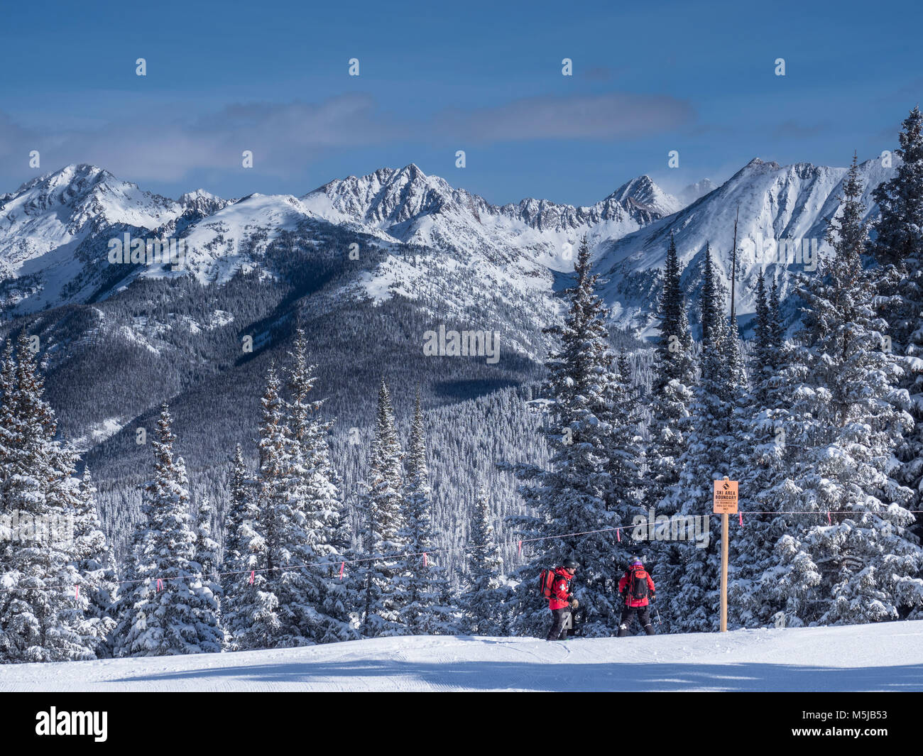 Ski Patrol members approach a closed area below Two Elk Lodge, winter ...