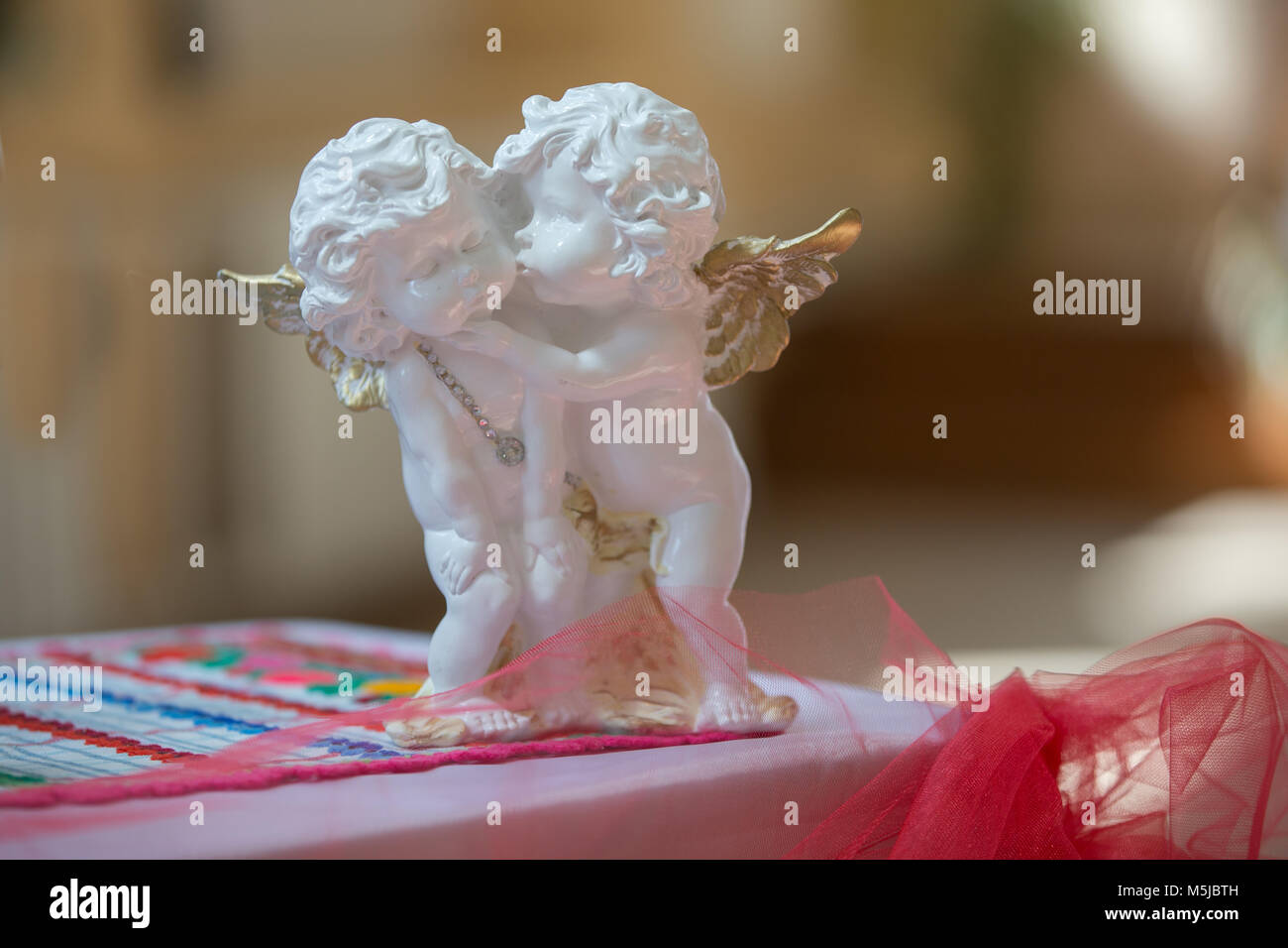 Two angels praying hi-res stock photography and images - Alamy