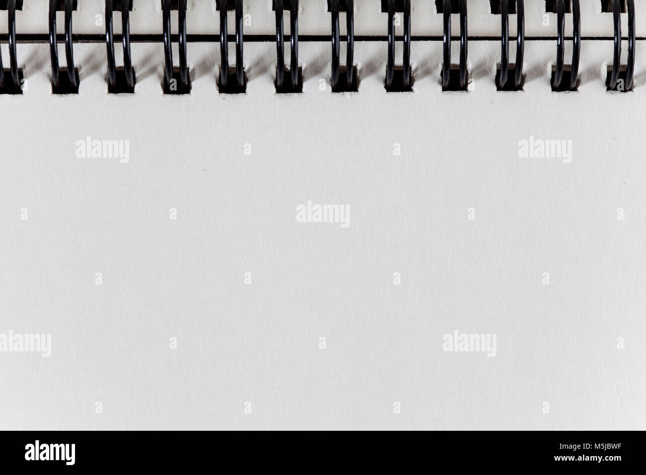 Watercolor paper notepad sheet with spiral background texture Stock ...