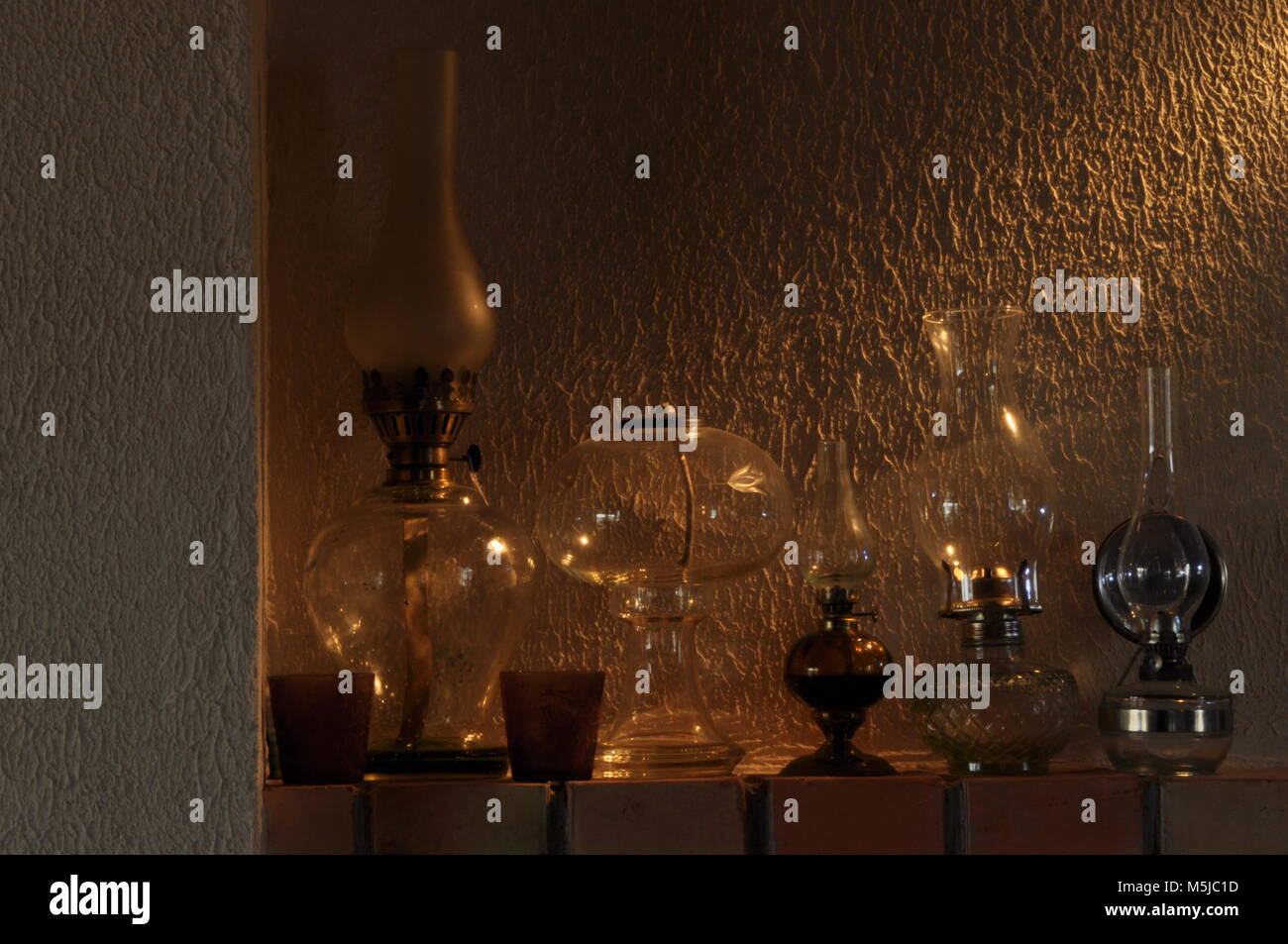 Oil lamps. Ornament on the mantelpiece. Light source. The Middle Ages ...