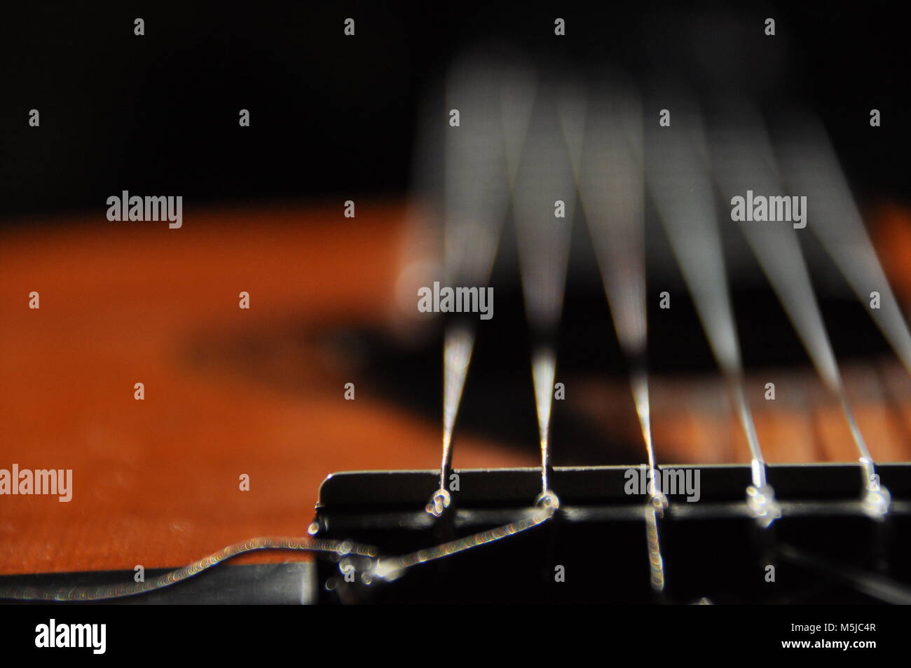 Classical guitar. Issuing a stringed instrument sounds. Fretboard ...