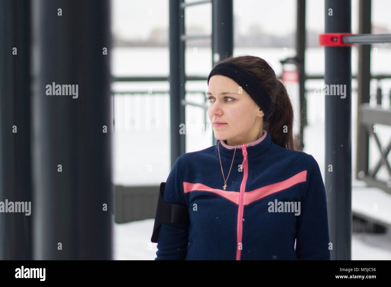 Healthy christian lifestile - young sporty woman at work out - cross ...