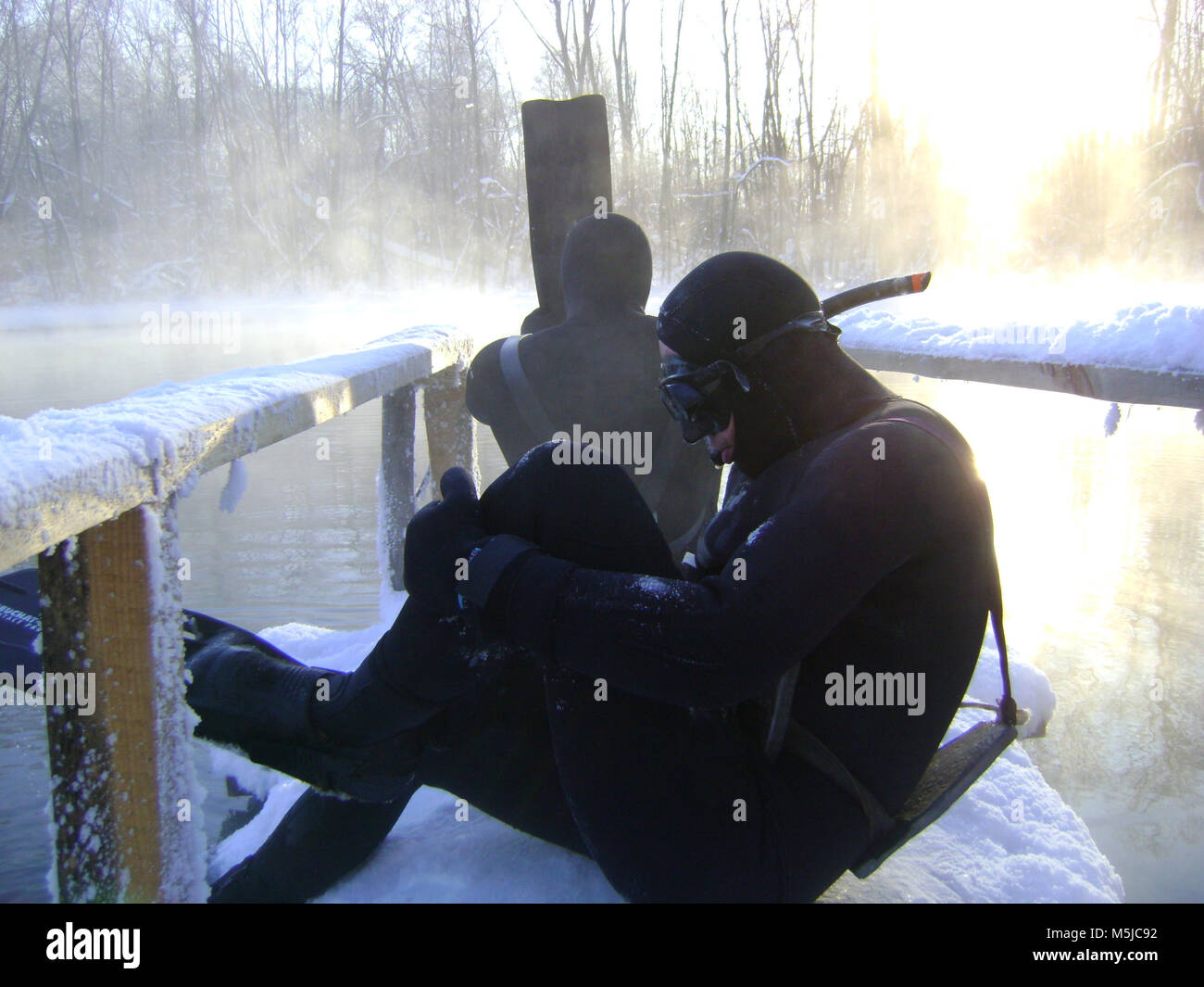 Scuba diver preparing diving gear hi-res stock photography and images ...
