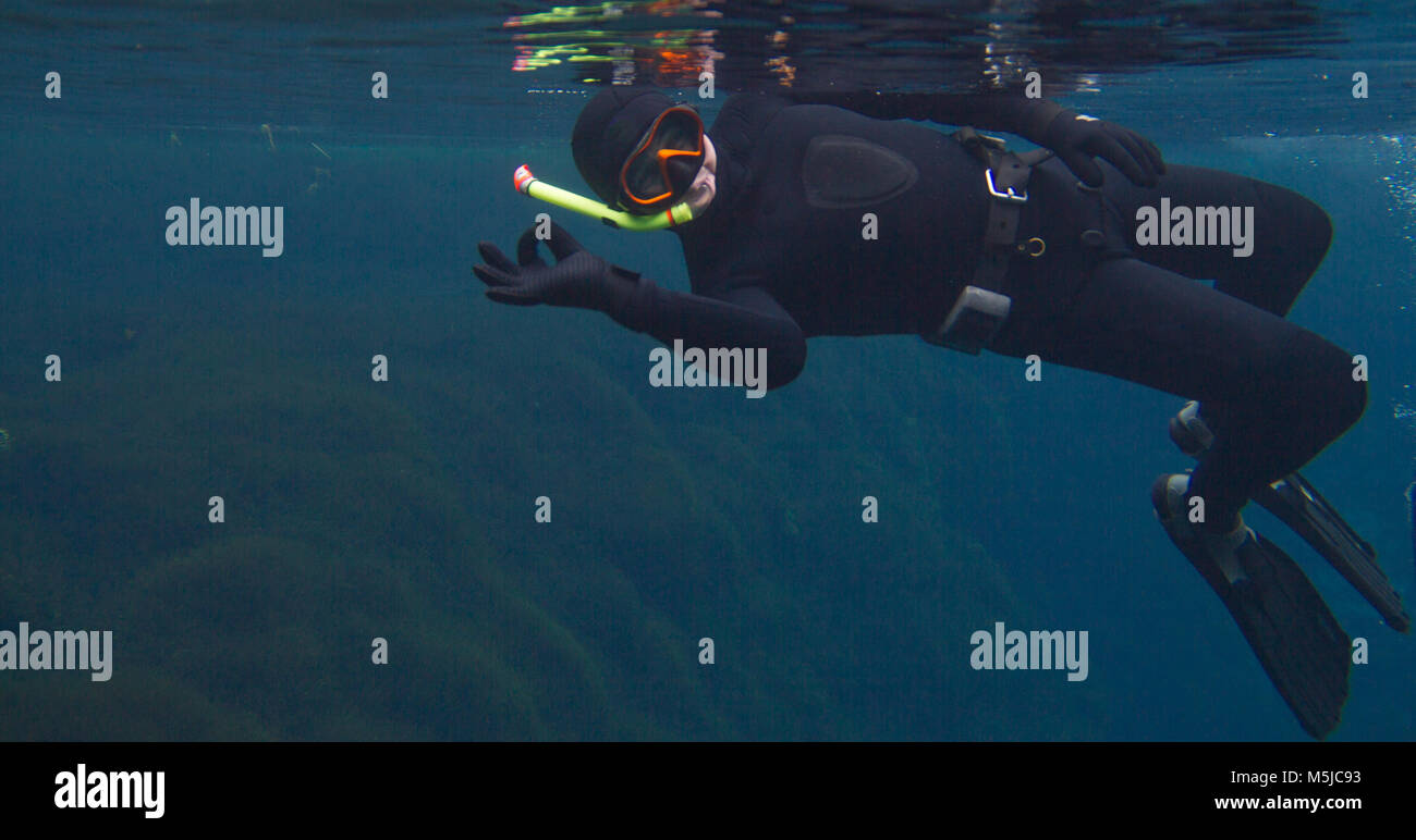 Underwater portrait of a man showing ok , freediving Stock Photo - Alamy