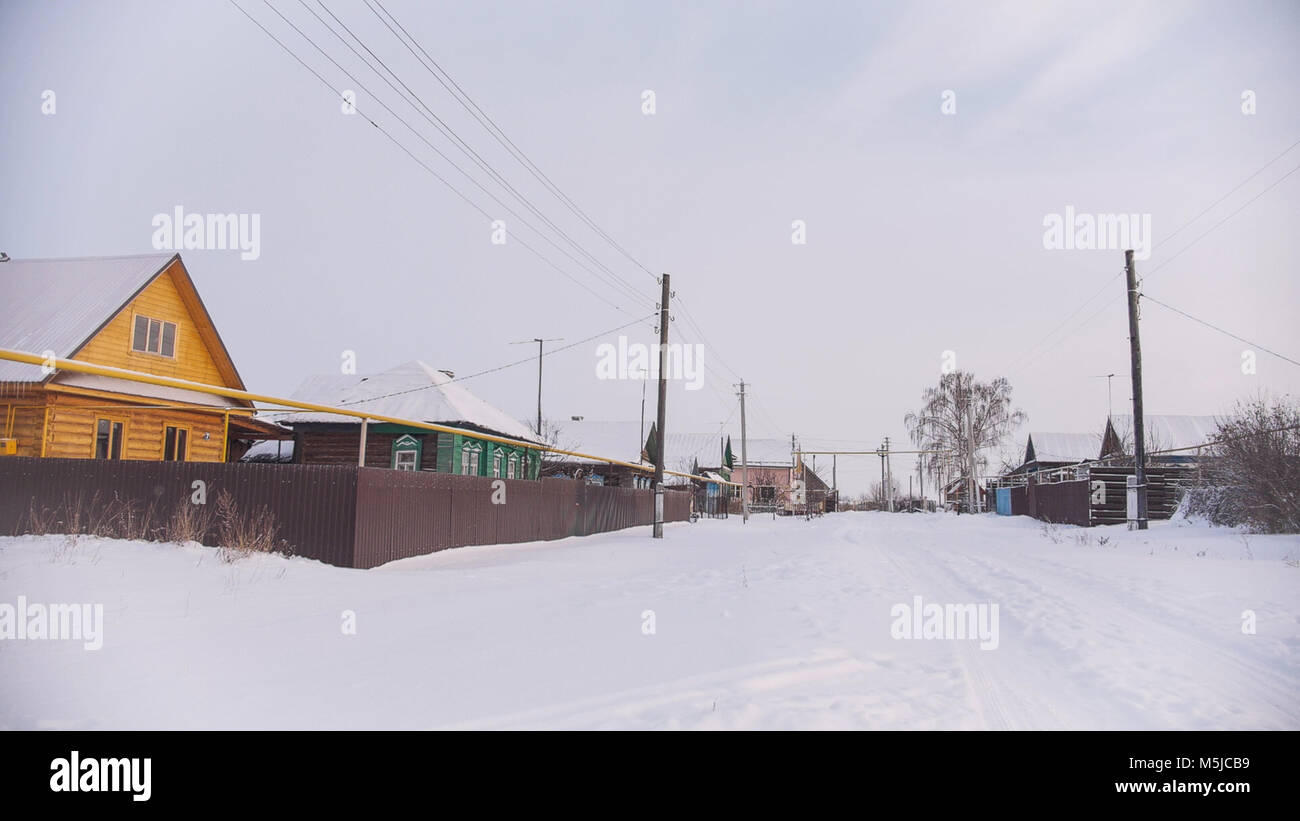Russian typical countryside - winter village in center of Volga, snow ...