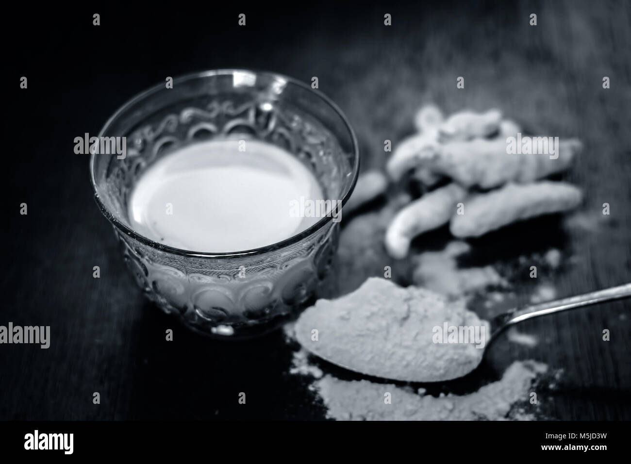 Tea of turmeric,Curcuma longa with its powder Stock Photo - Alamy