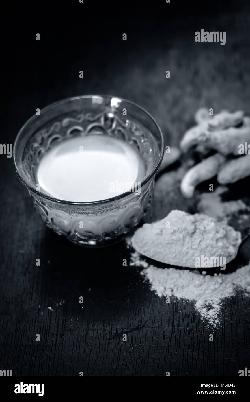 Tea of turmeric,Curcuma longa with its powder Stock Photo - Alamy