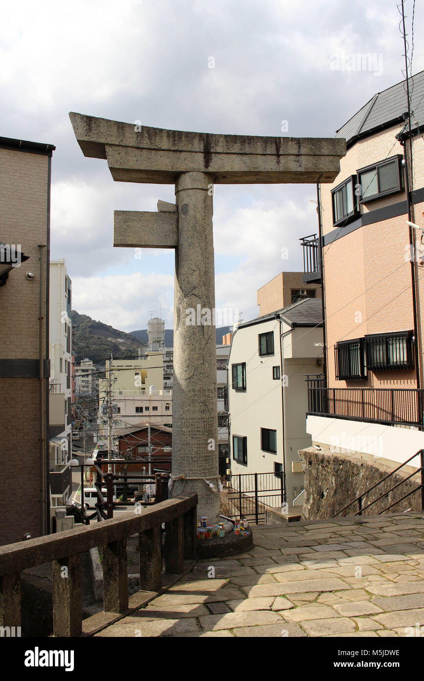 Translation: "The one-legged torii" (shinto) gate due to bombing. Taken ...