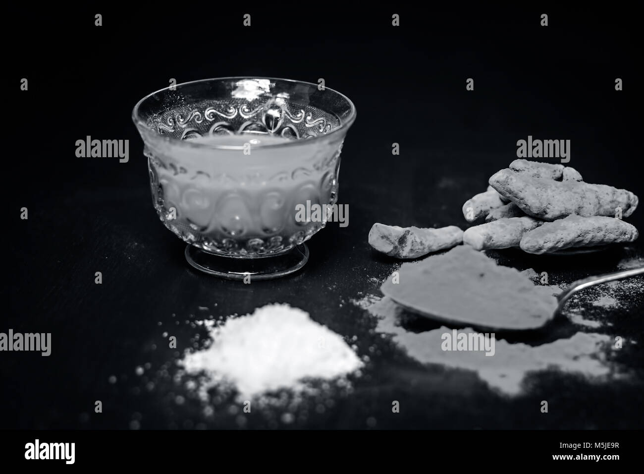 Tea of turmeric,Curcuma longa with its powder Stock Photo - Alamy