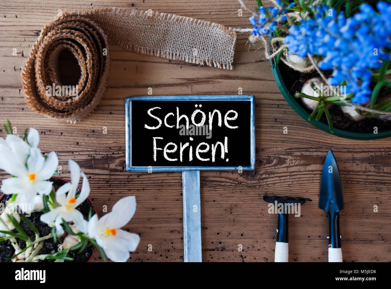 Sign With German Text Schoene Ferien Means Happy Holidays. Spring ...