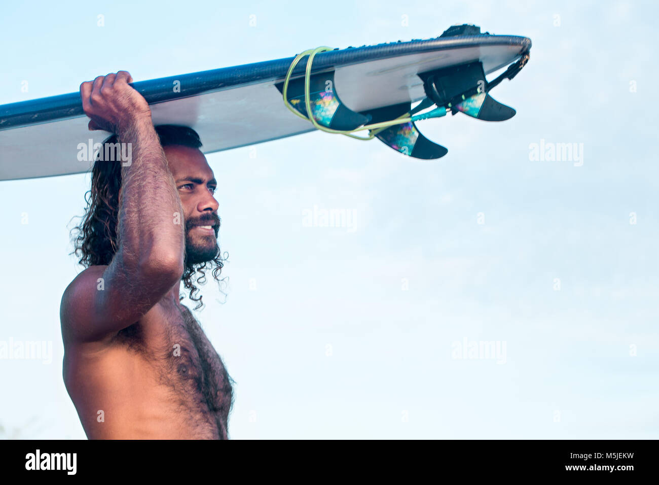 Board for surfing on the head Stock Photo - Alamy