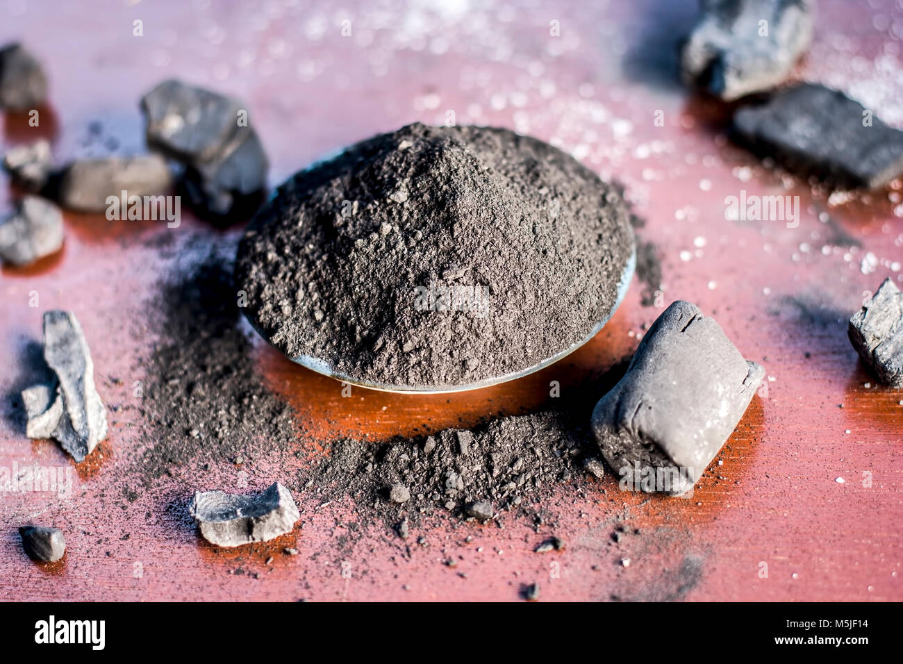 Close up of coal powder for toothache and toothpaste of traditional ...