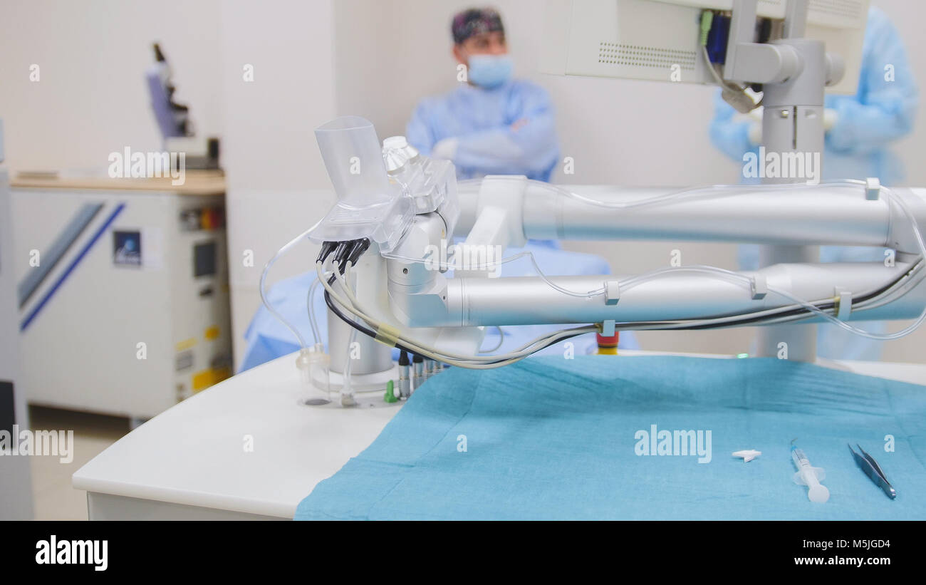 Surgical room - medics prepare for ophthalmology surgery Stock Photo ...
