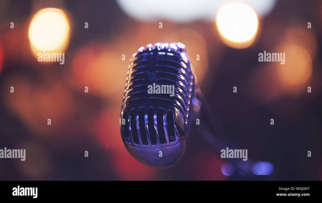 Vocal microphone in night club Stock Photo - Alamy