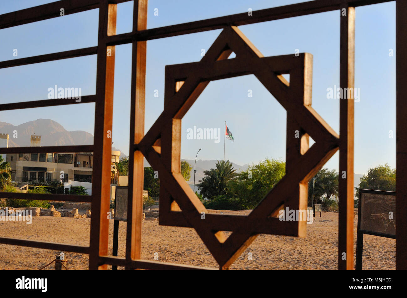 Jordan flag is seen through the eight corner star, Aqaba, Jordan Stock ...