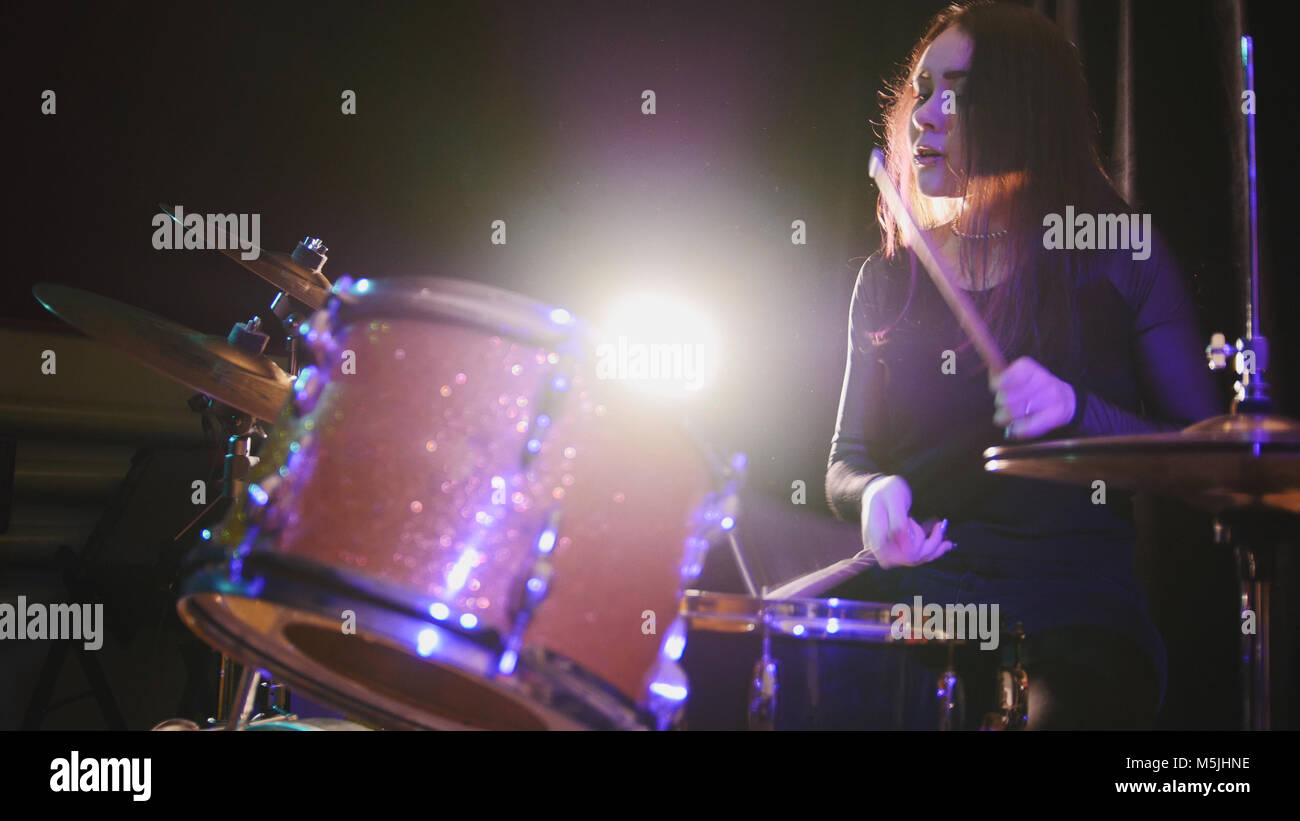 Teen rock music - sensual girl with flowing hair percussion drummer ...