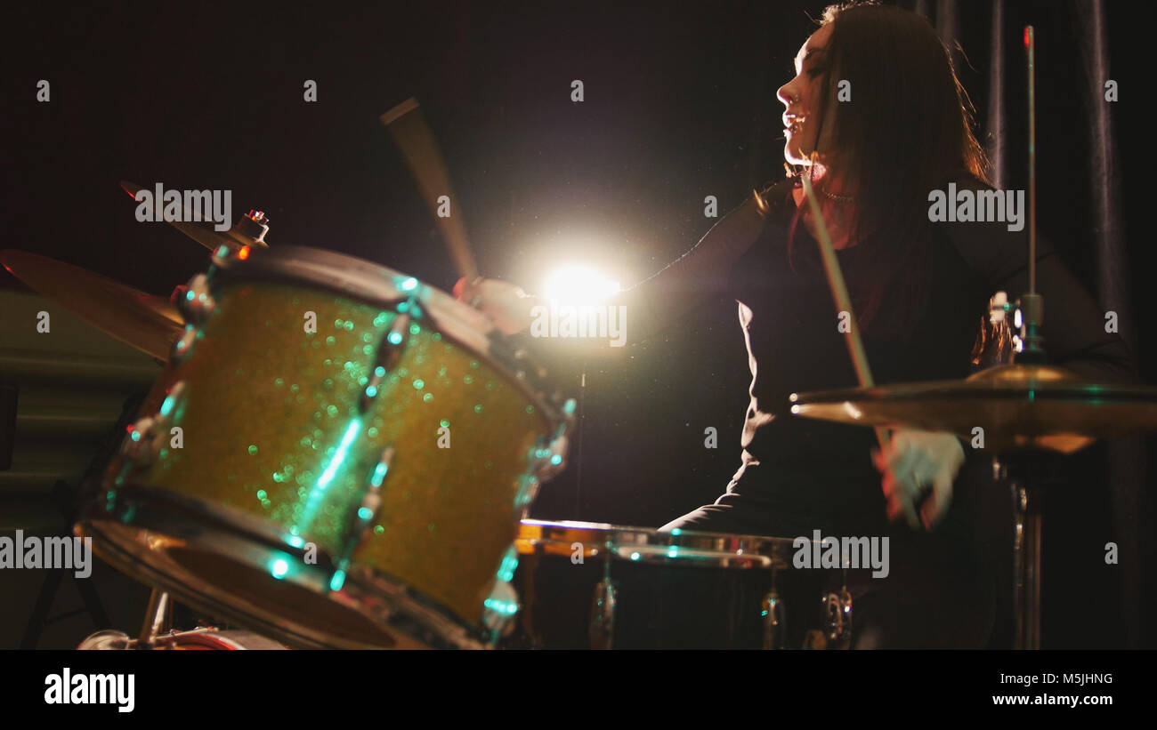 Gothic black hair girl percussion drummer perform music break down ...