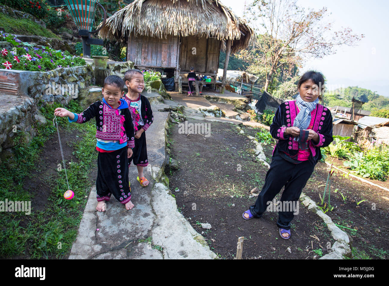 CHIANG MAI, THAILAND - FEBRUARY 18, 2017 - An Akha family pose for ...